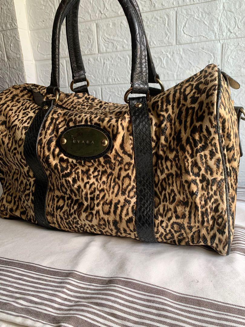 Evada leopard boston bag, Luxury, Bags & Wallets on Carousell