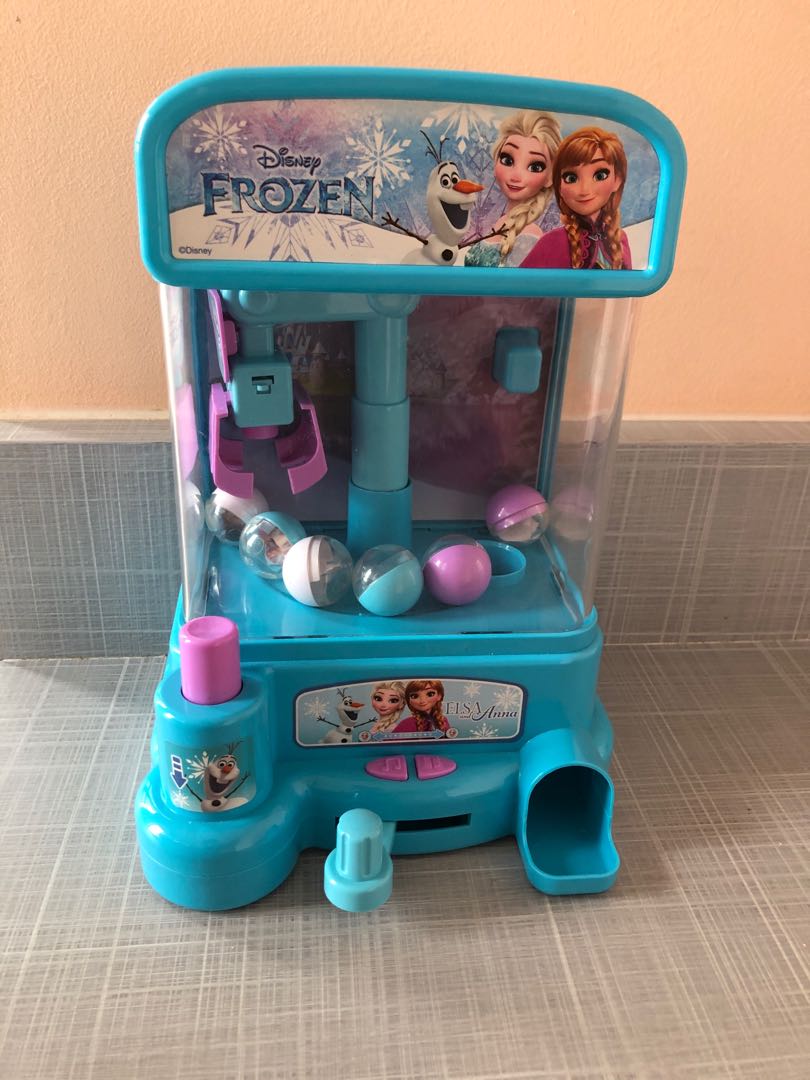 Good condition frozen Anna Elsa claw machine, Hobbies & Toys, Toys ...
