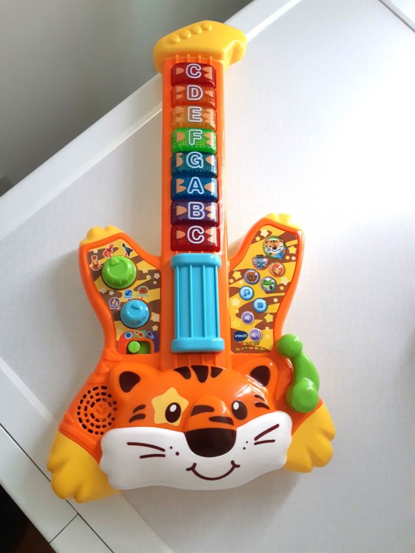 Vtech Zoo Jamz Tiger rock guitar, Babies & Kids, Infant Playtime on ...