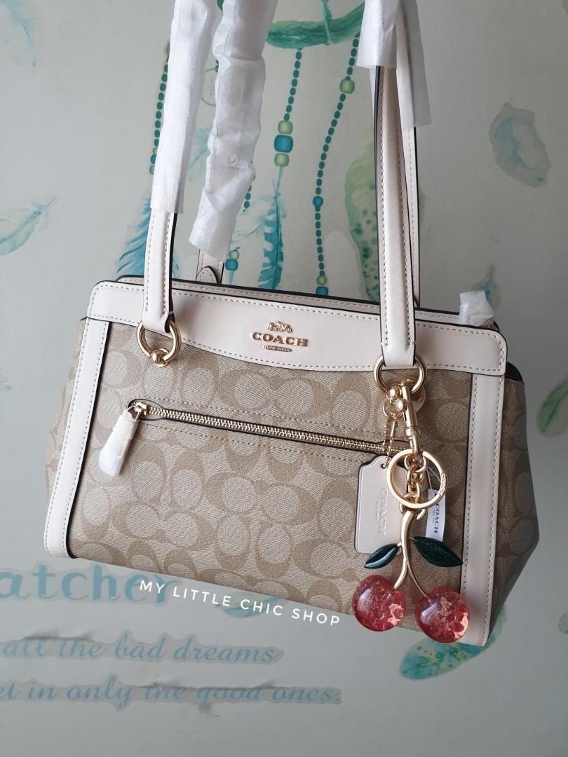 Coach kailey carryall in signature canvas, Women's Fashion, Bags ...
