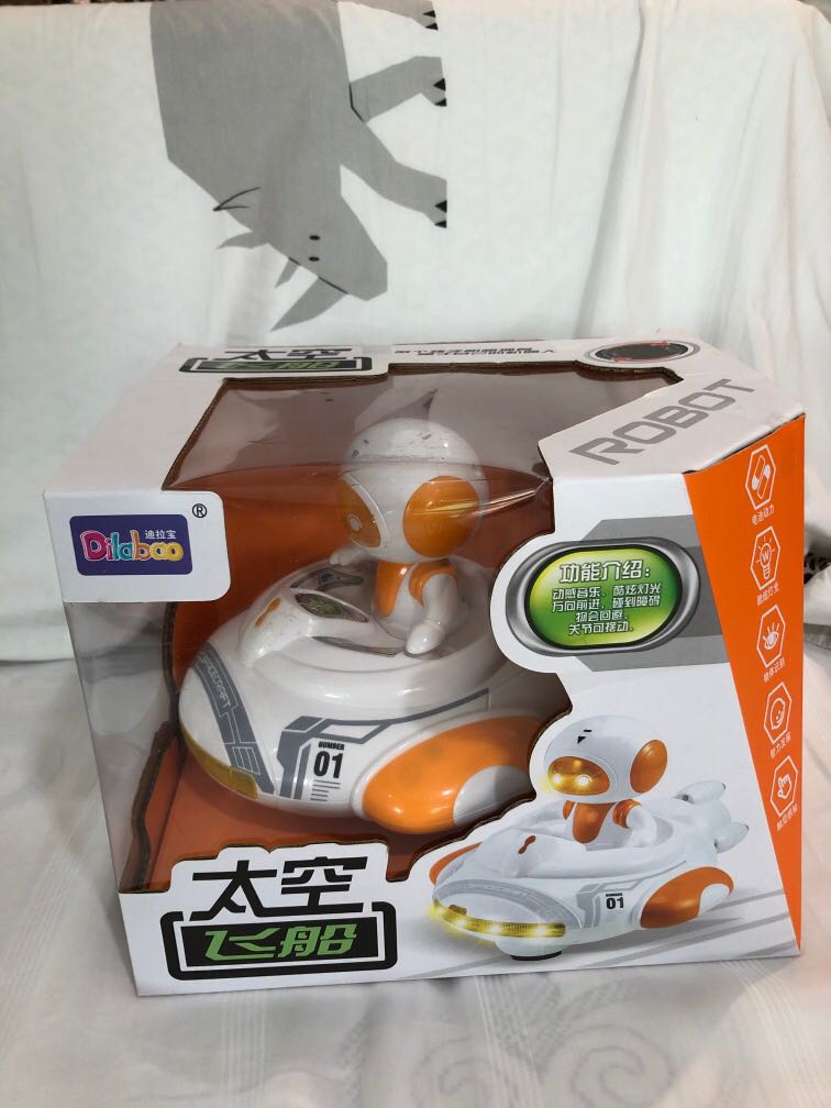 Light up robot toy with music, Babies & Kids, Infant Playtime on Carousell