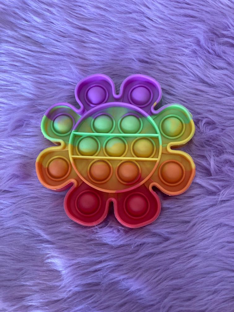 Rainbow flower pop it fidget toy, Hobbies & Toys, Toys & Games on Carousell