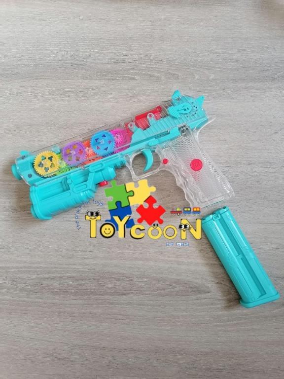 Kids See Through Gear Wheel Light Gun with music with Snap On Rubber ...