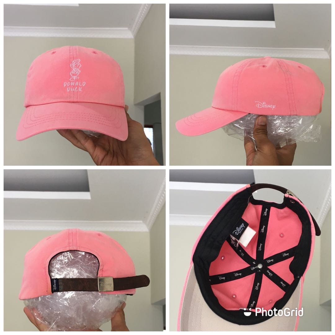 Topi pink donald duck, Fesyen Wanita, Aksesoris di Carousell