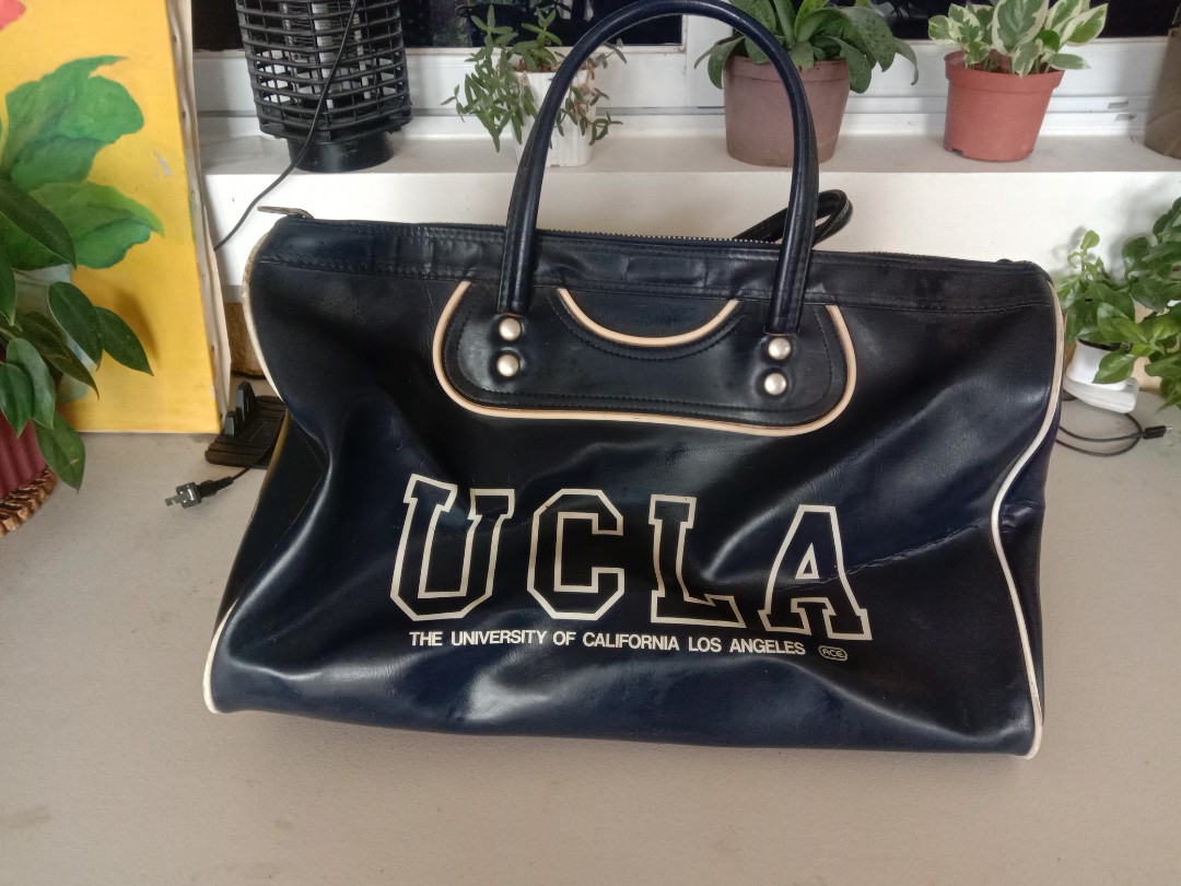 retro university duffle bag, Luxury, Bags & Wallets on Carousell