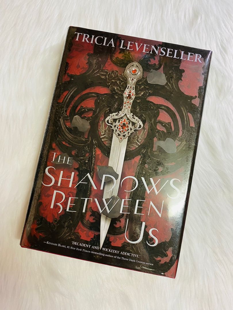 The Shadow Between Us - Tricia Levenseller, Hobbies & Toys, Books ...
