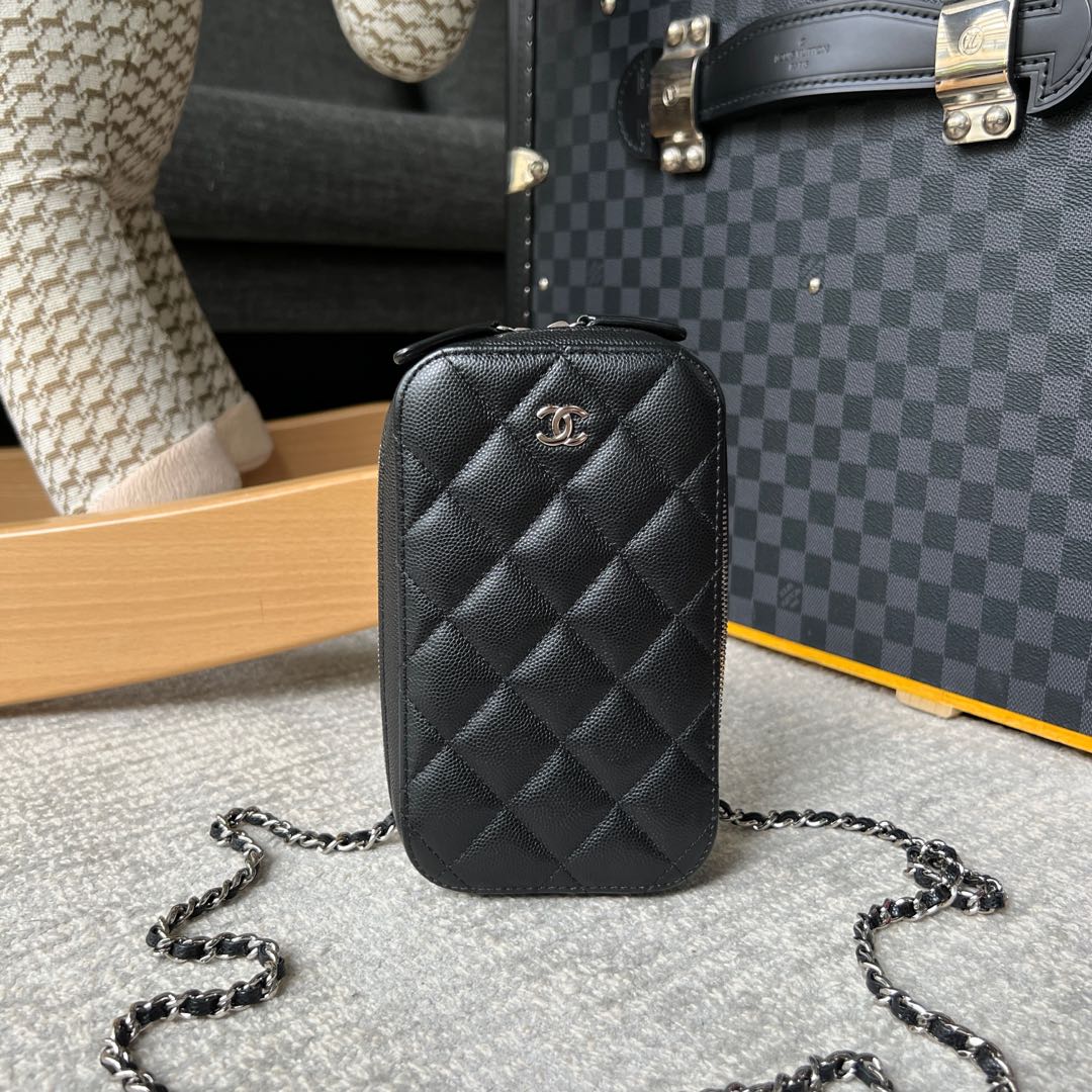 Chanel Vertical Tech Case, Luxury, Bags & Wallets on Carousell