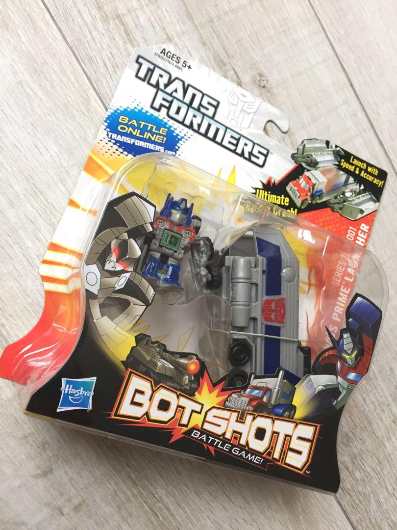 Transformers bot shots Optimus Prime launcher/ Megatron launcher ...