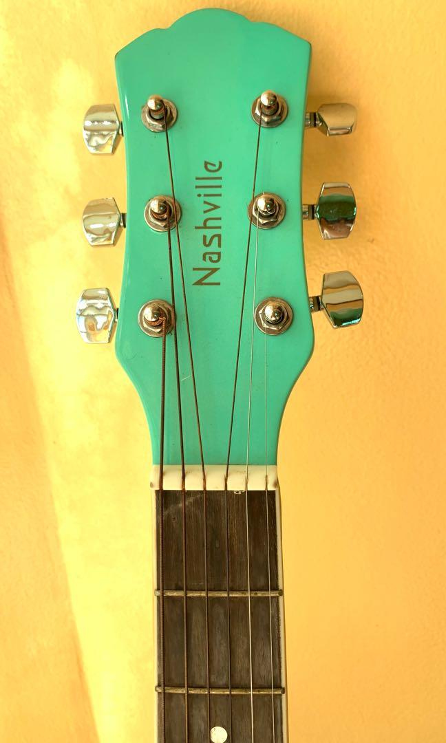 Pre-loved mint green acoustic guitar w/ tuner, extra strings and guitar ...