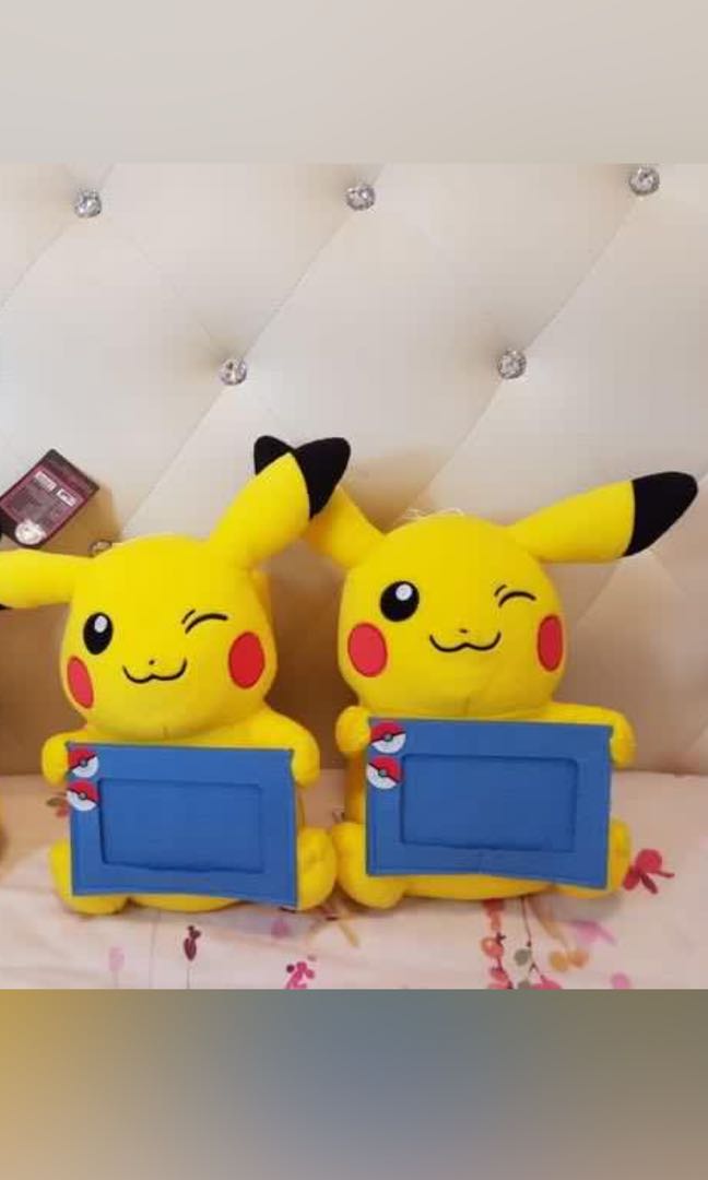 Adorable Pikachu with photo frame (brand new from Timezone), Hobbies ...