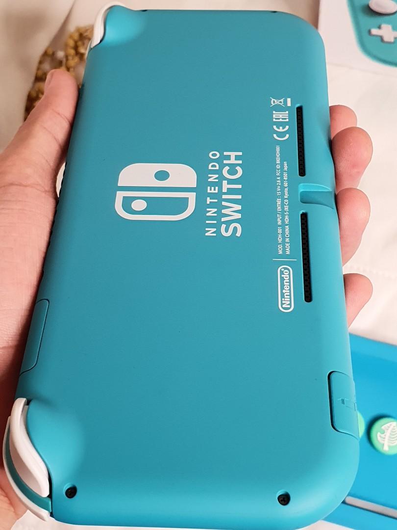 Nintendo Switch Lite Teal Like New with free games, Video Gaming, Video ...