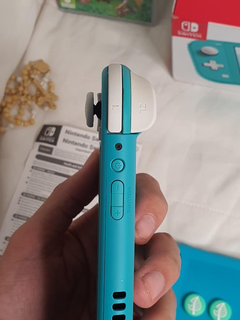 Nintendo Switch Lite Teal Like New with free games, Video Gaming, Video ...