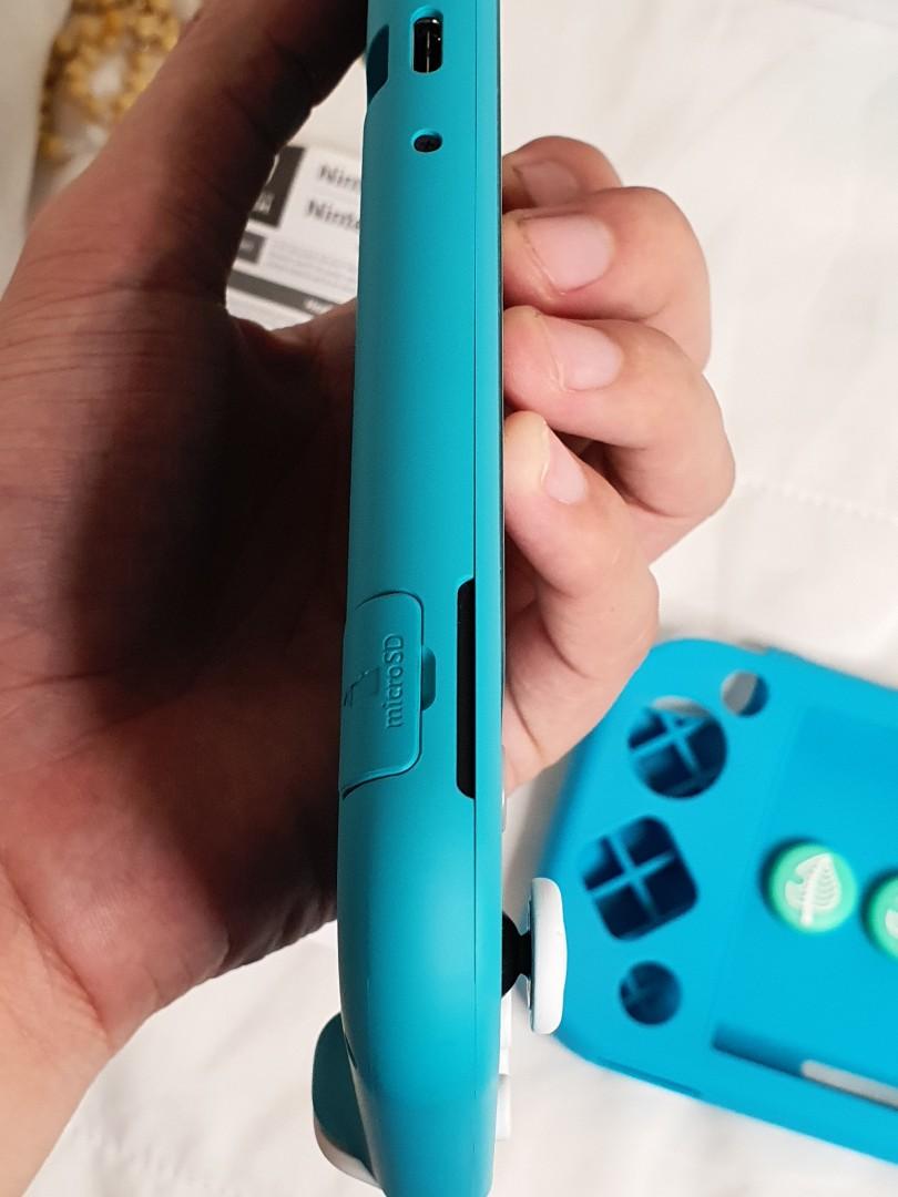 Nintendo Switch Lite Teal Like New with free games, Video Gaming, Video ...