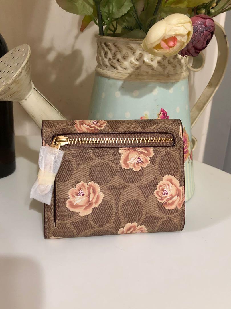 Coach floral wallet, Luxury, Bags & Wallets on Carousell