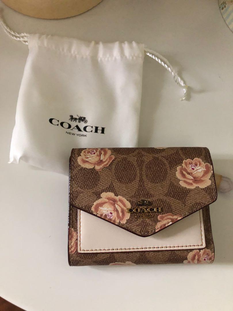 Coach floral wallet, Luxury, Bags & Wallets on Carousell