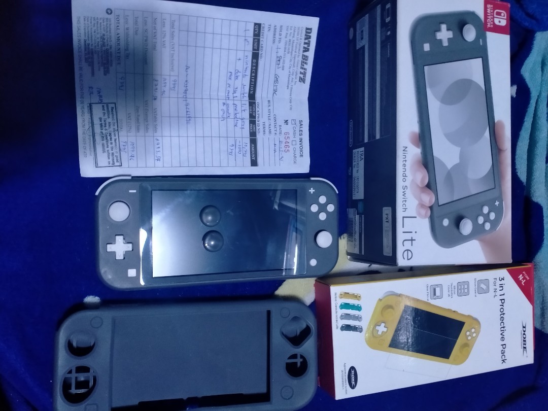 Nintendo Switch Lite with Warranty/Receipt and Games, Video Gaming ...
