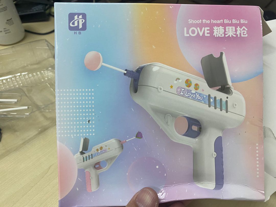 Lollipop candy gun, Luxury, Accessories on Carousell