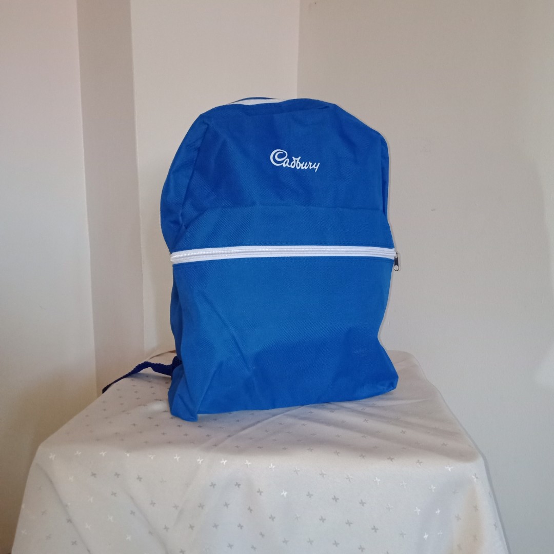 Cadbury Backpack, Men's Fashion, Bags, Backpacks on Carousell