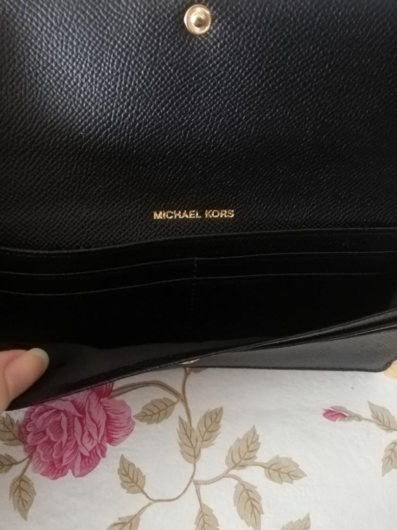 Michael Kors Slim Wallet, Luxury, Bags & Wallets on Carousell