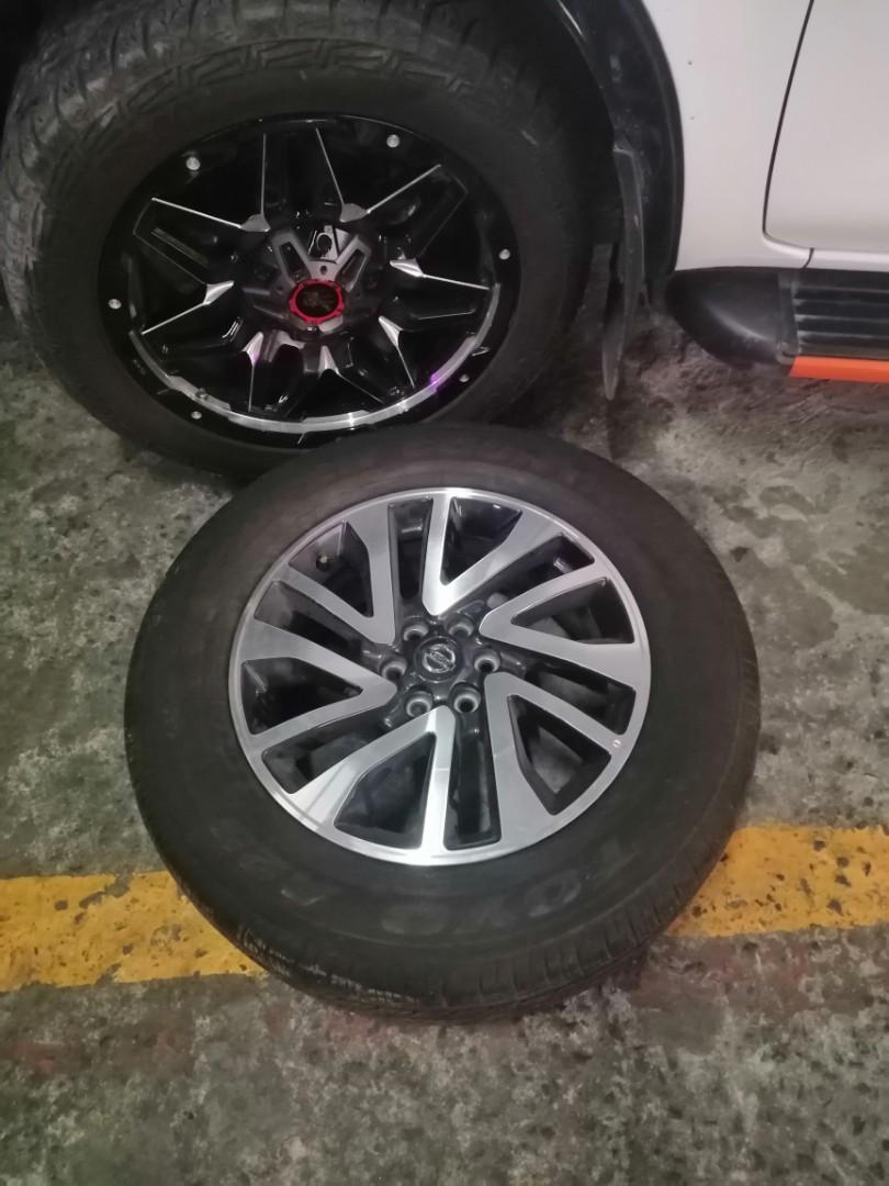 Navara stock mags with 255/60r18 toyo tires, Car Parts & Accessories ...