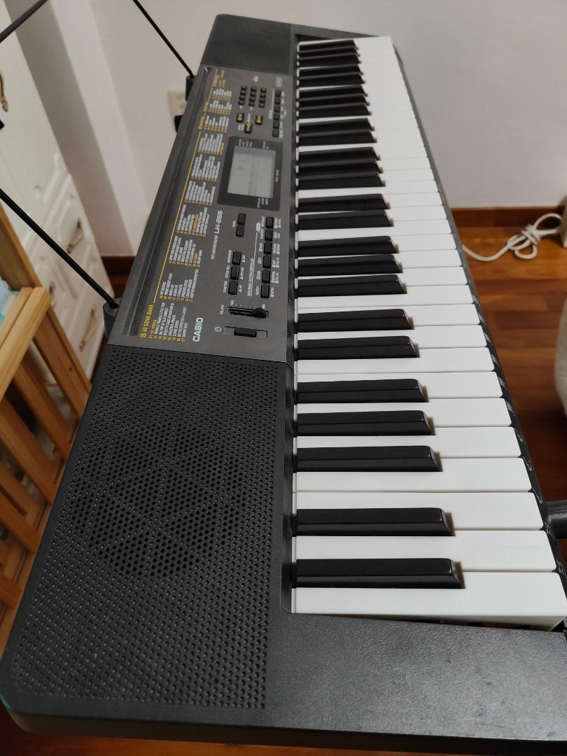 Casio LK-265 61-Key Lighted Portable Touch Sensitive Keyboard with free stand, Hobbies & Toys ...