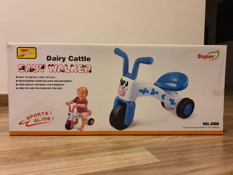 Dairy Cattle baby walker, Babies & Kids, Infant Playtime on Carousell