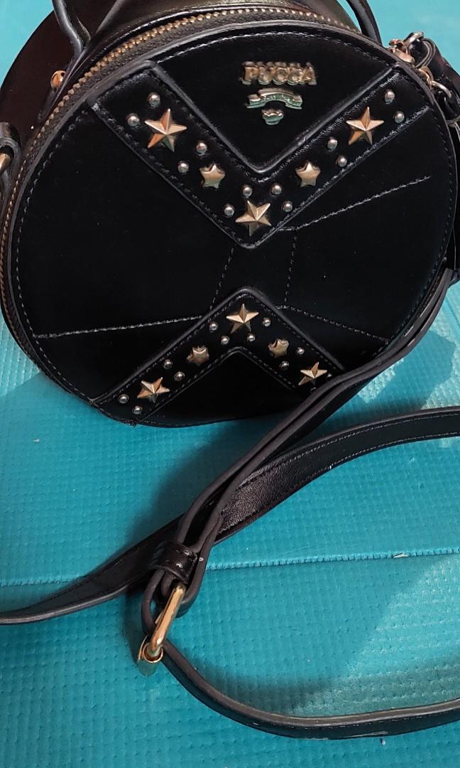 pucca round sling stand alone, Luxury, Bags & Wallets on Carousell