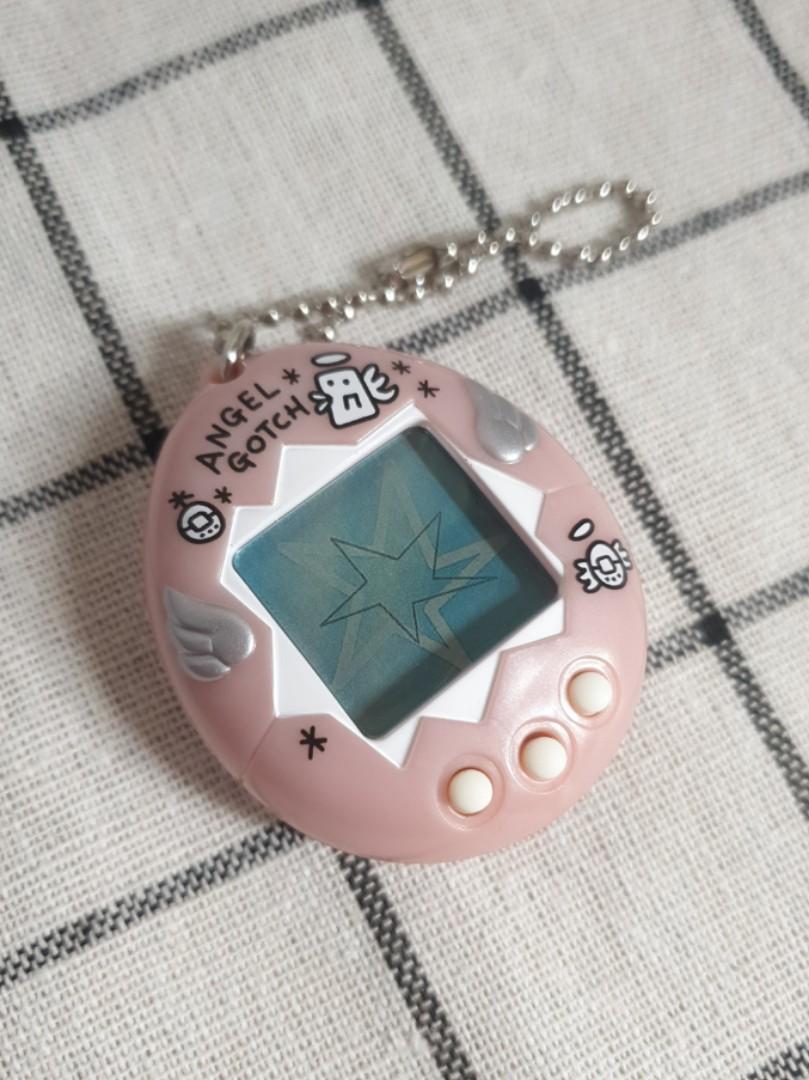 Tamagotchi Angelgotch 1997 (USED), Hobbies & Toys, Toys & Games on ...
