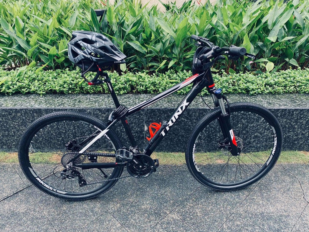 Trinx (2021 model with Hydraulic Brakes + Shimano Parts) + Helmets ...