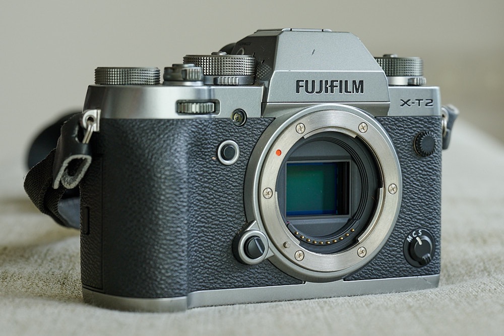 Fujifilm X-T2 silver body + battery grip, Photography, Cameras on Carousell