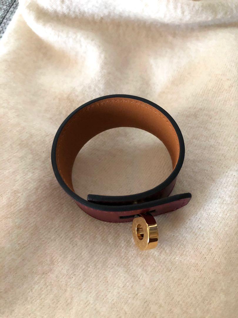 Hermes hip hop leather bracelet in Hermes red / burgundy color and gold ...