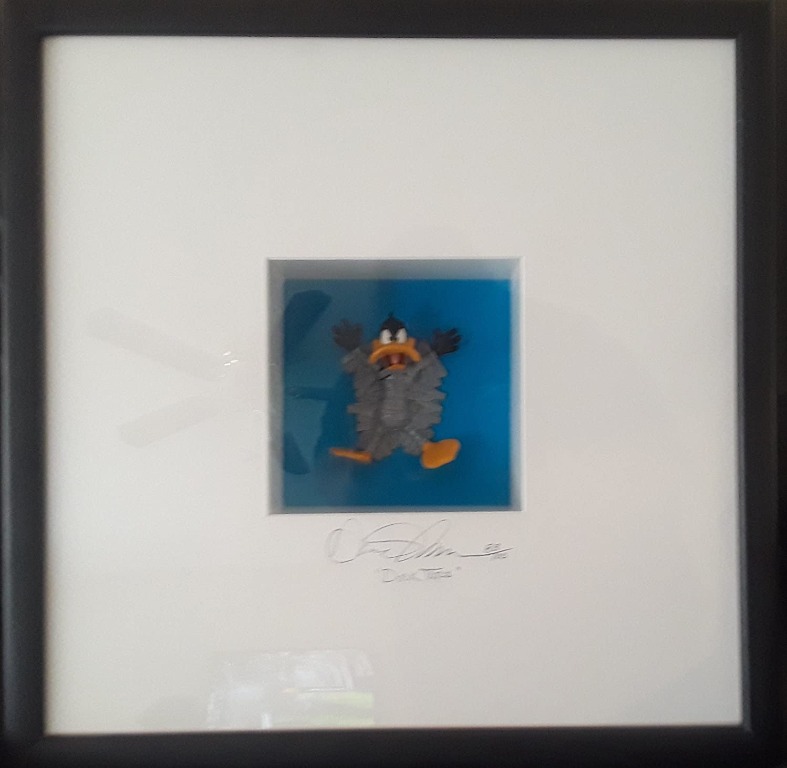 Daffy duck figurine in display frame, Furniture & Home Living, Home ...