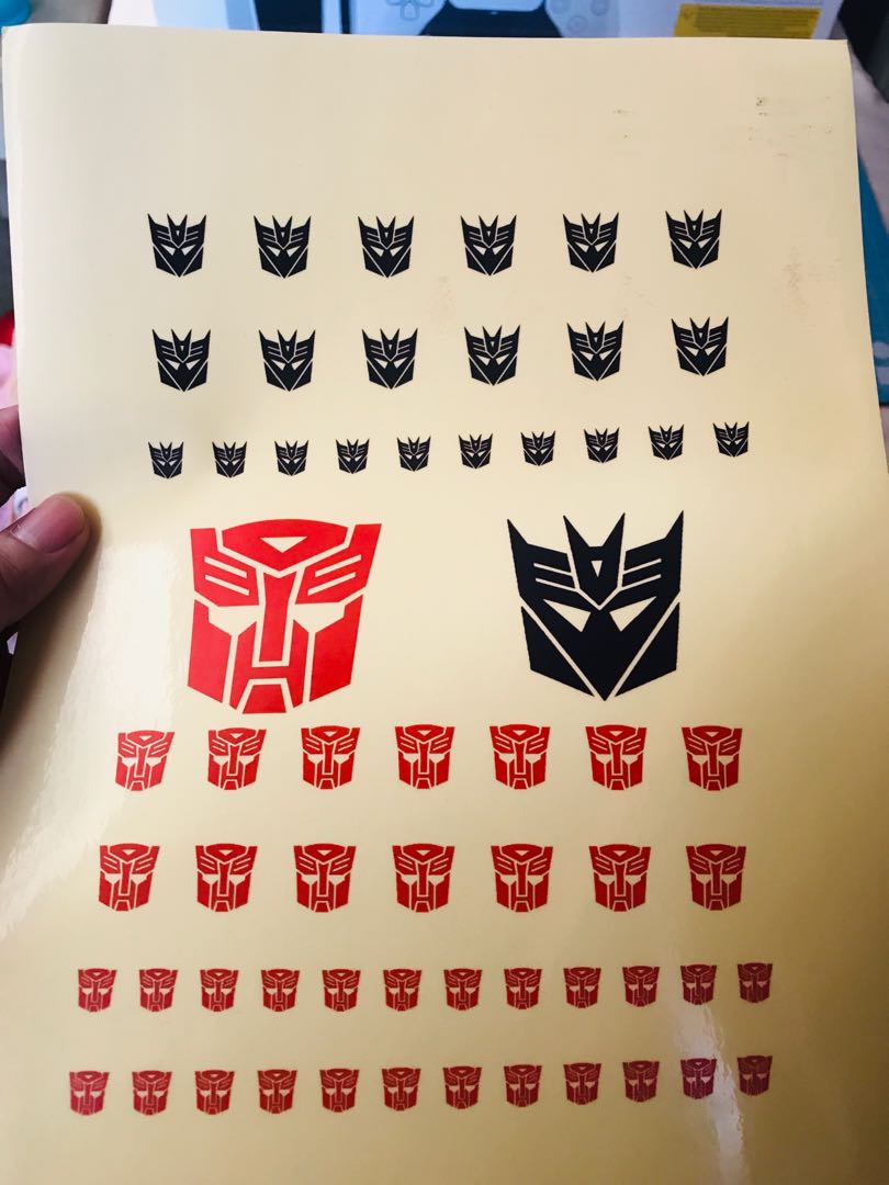 Transformers insignia, Hobbies & Toys, Toys & Games on Carousell