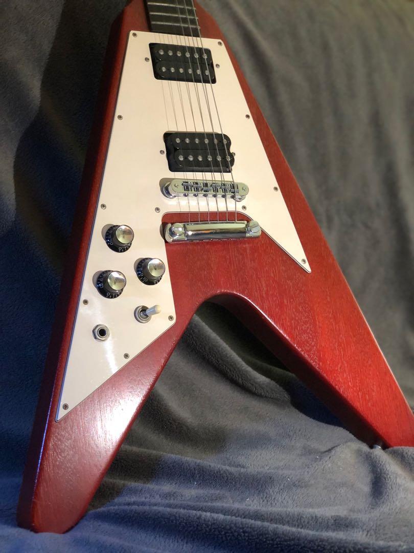 Left-handed Gibson Flying V (2002 faded cherry red), Hobbies & Toys ...