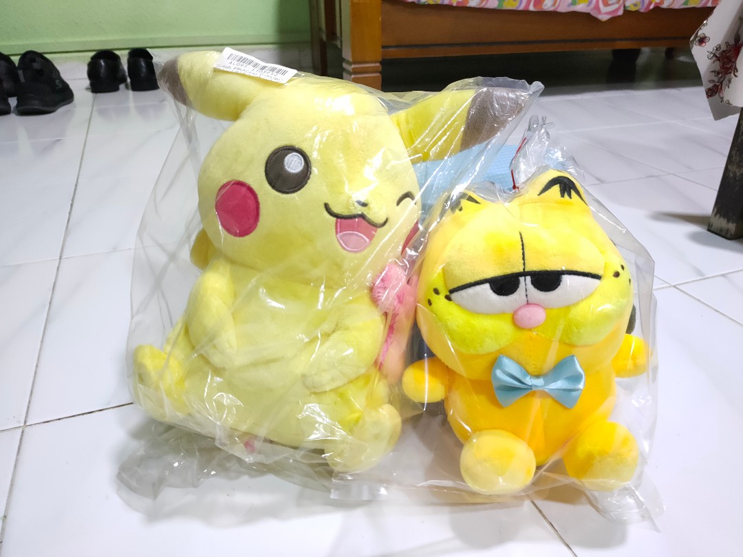 Soft toys (Pikachu & Garfield), Hobbies & Toys, Toys & Games on Carousell