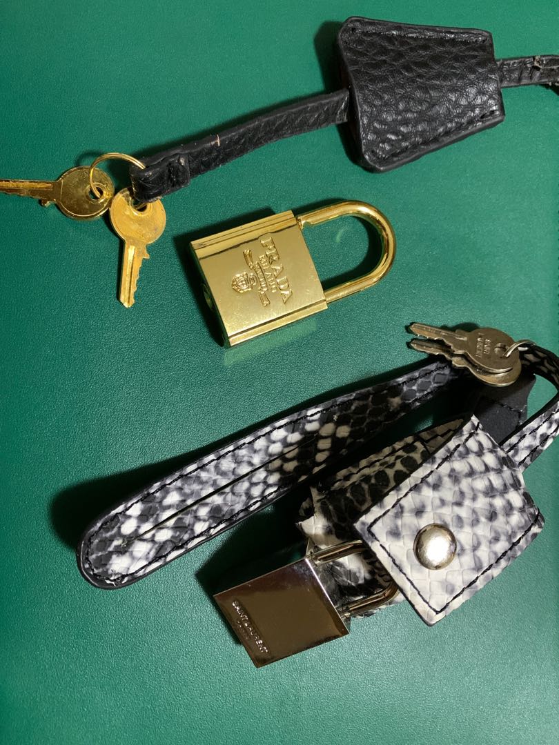 Prada YSL lock and key, Luxury, Bags & Wallets on Carousell