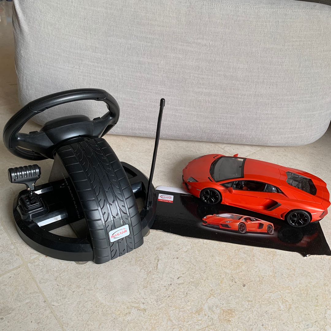 RC Lamborghini car + racing wheel controller Rastar, Hobbies & Toys ...