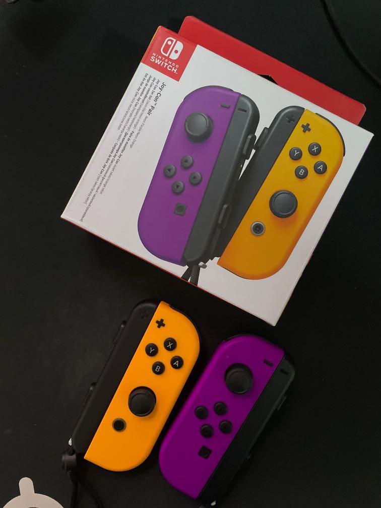 Nintendo switch joy con orange and purple, Video Gaming, Gaming ...