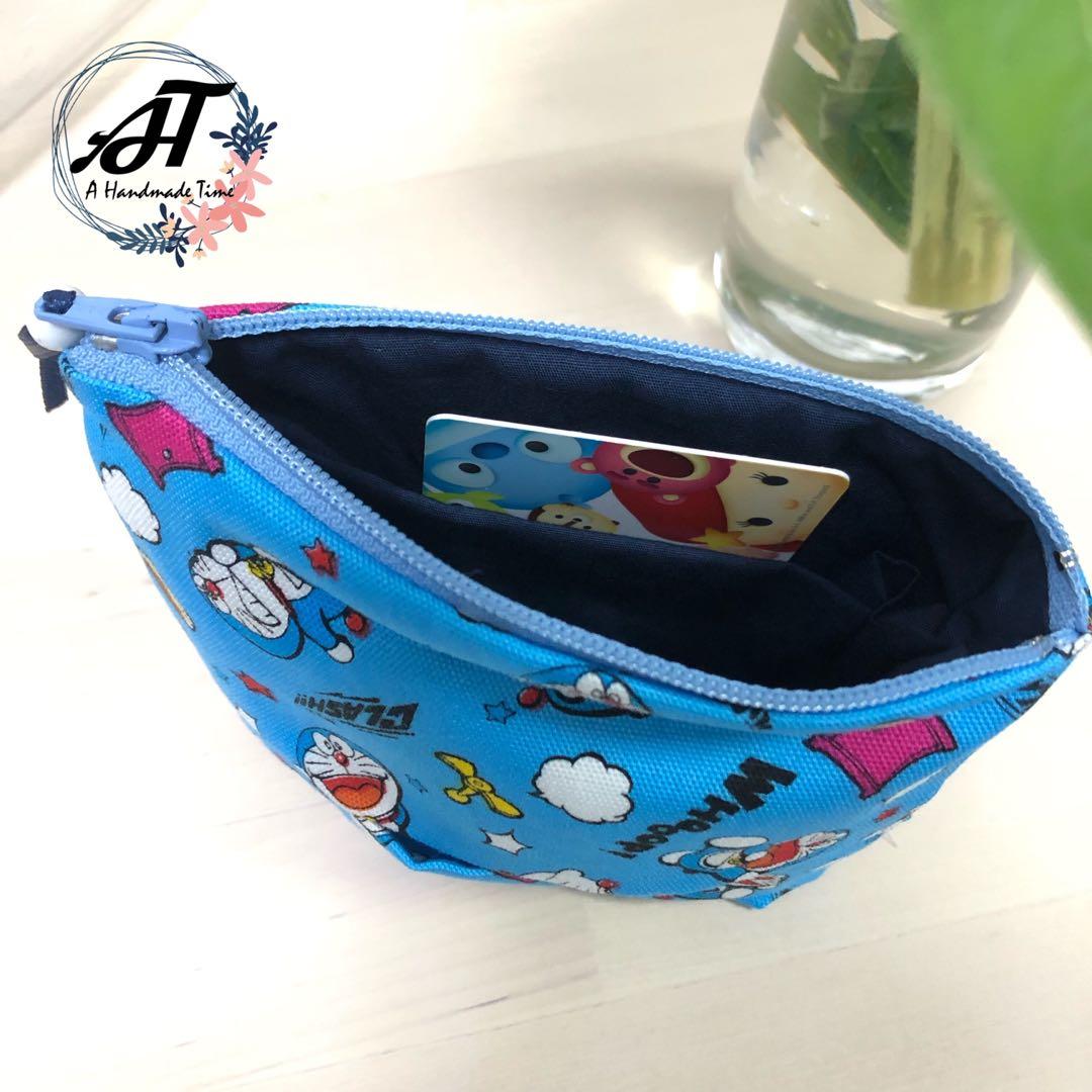 Doraemon fabric 2 in 1 coin and tissue purse, Hobbies & Toys ...