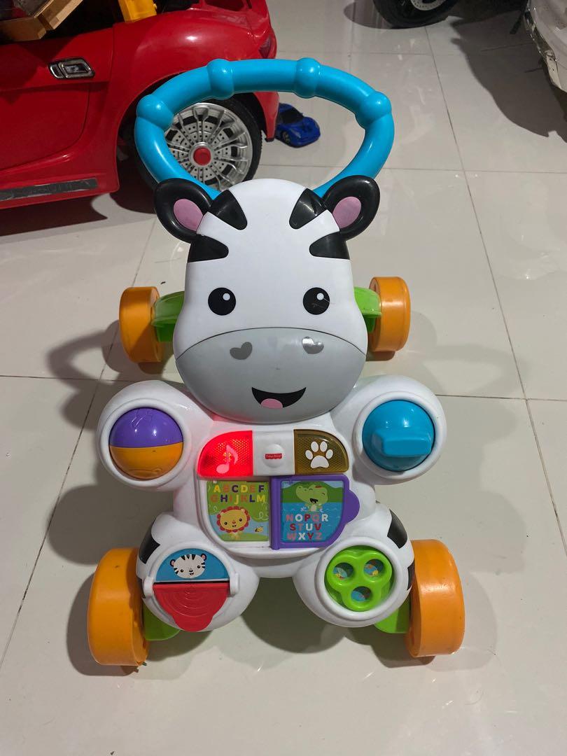 Fisher price zebra baby walker (good condition), Babies & Kids, Infant ...