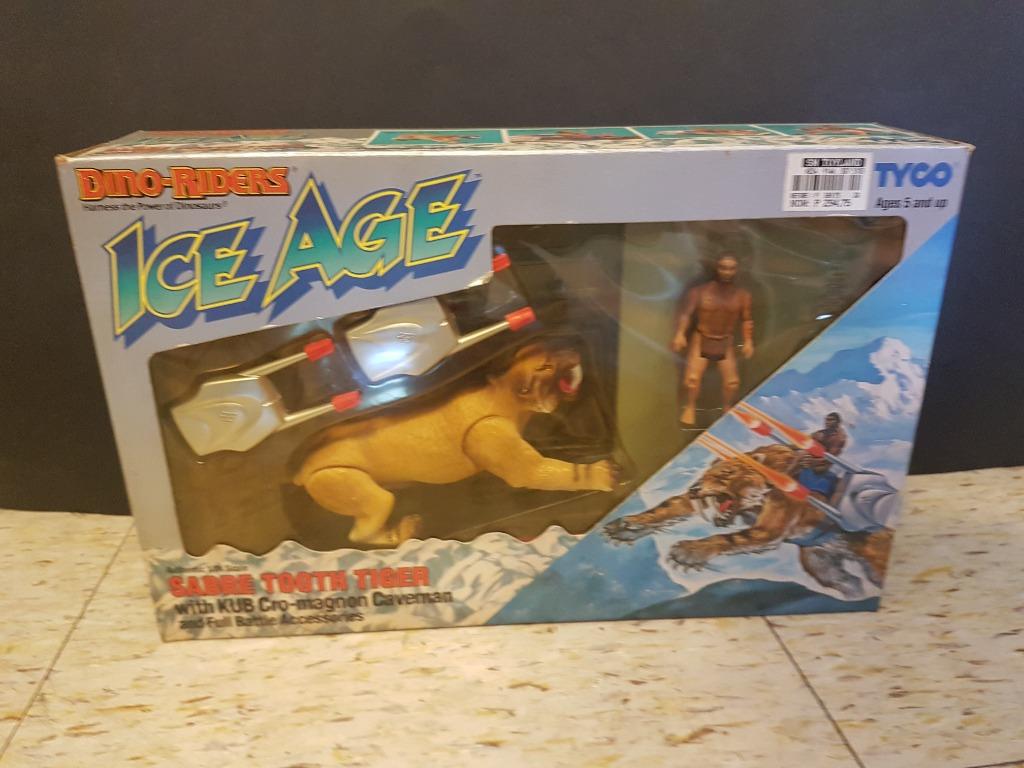 Tyco Dino-Riders Ice Age: Sabre Tooth Tiger with Kub, Hobbies & Toys ...