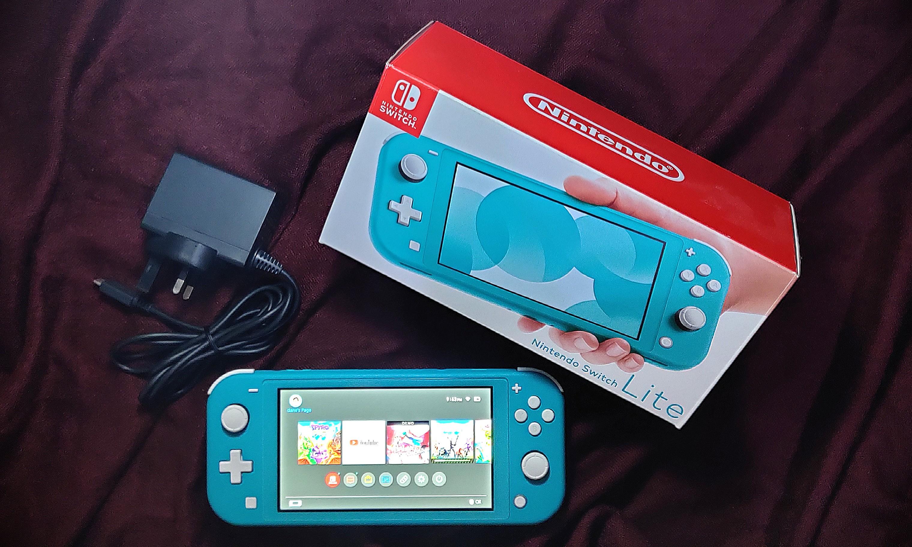 Nintendo Switch Lite in Turquoise - munimoro.gob.pe