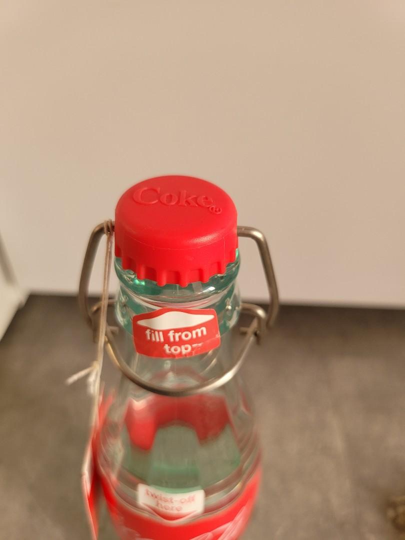 Coca cola cool gear Swing Top bottle, Food & Drinks, Beverages on Carousell