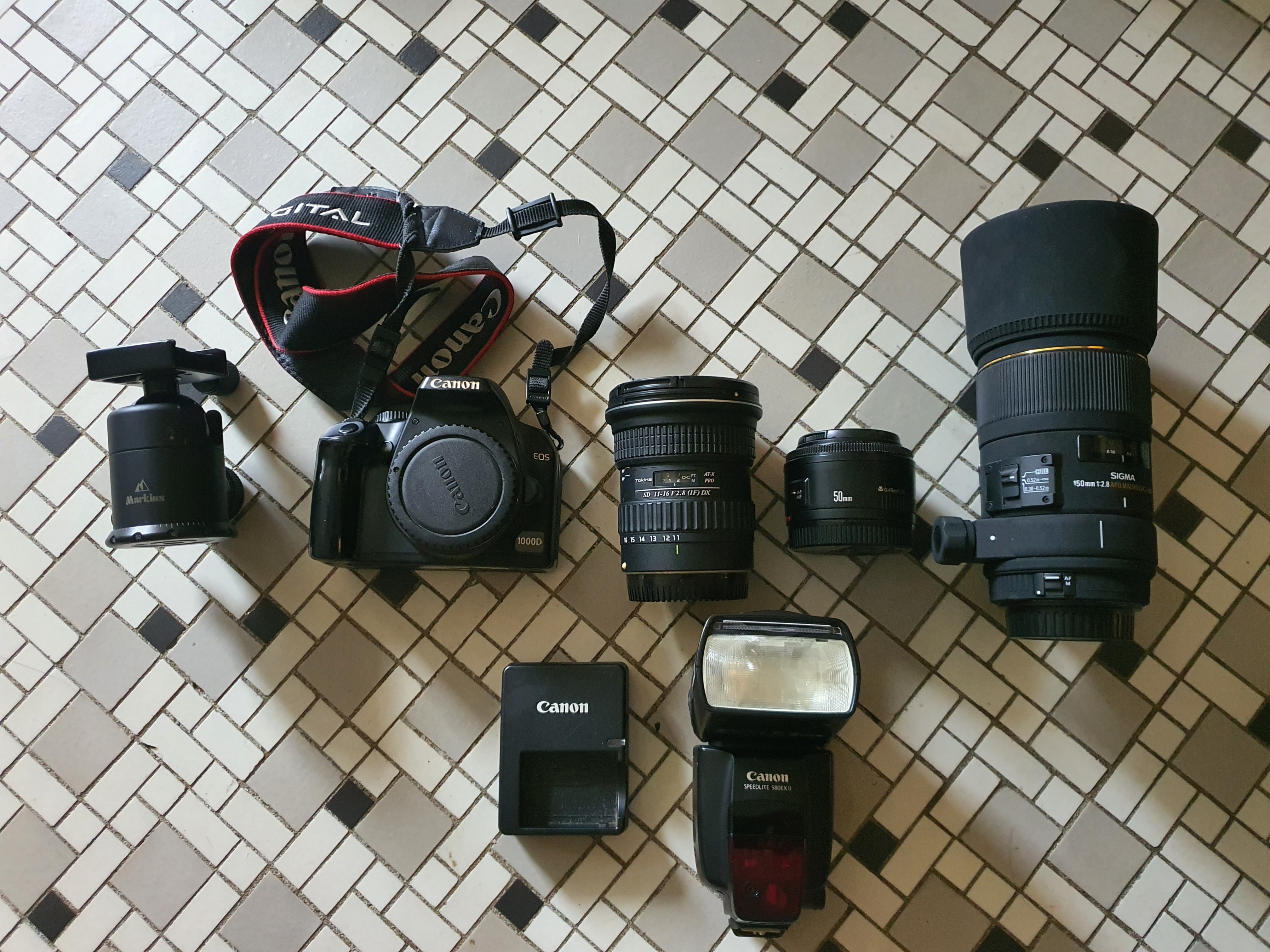 Canon 1000D and various lenses, flash and ballhead (individual sale now ...