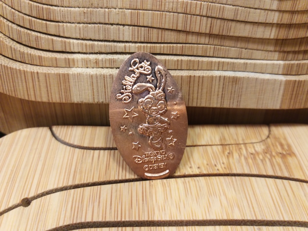 日本廸士尼 海洋 Stella Stellalou 金幣 銅片 壓幣 Pin Coin, 興趣及遊戲, 玩具 & 遊戲類 - Carousell