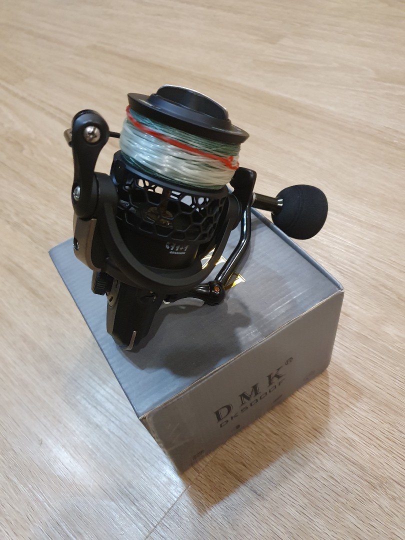Spinning reel (DMK), Sports Equipment, Fishing on Carousell