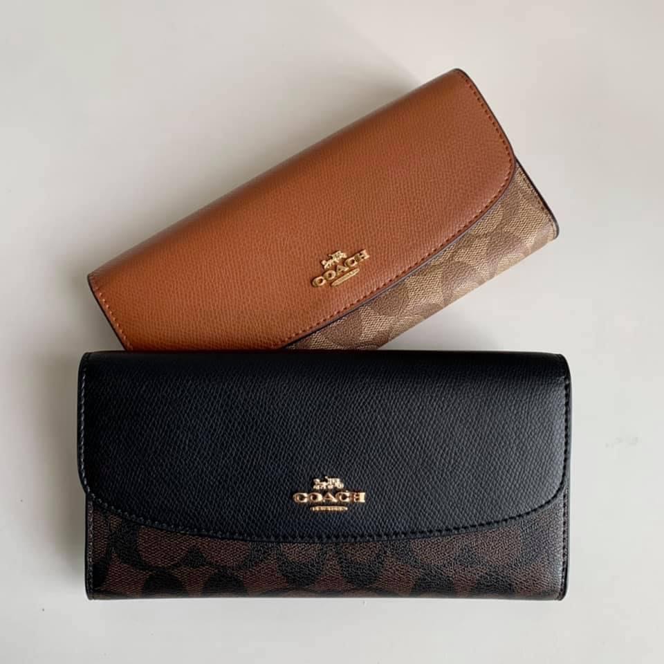 Coach Slim Envelope Wallet in Signature Canvas, Women's Fashion, Bags ...