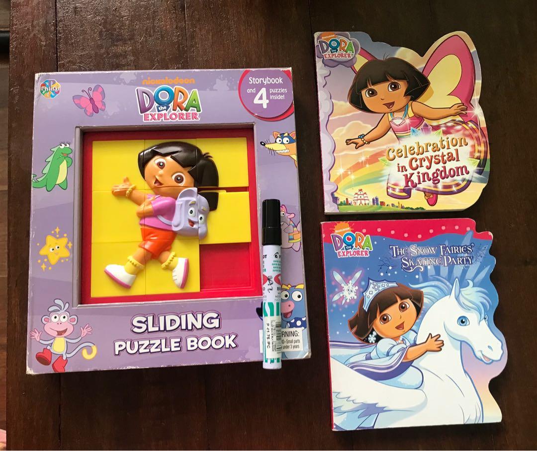Dora sliding puzzle board books bundle, Hobbies & Toys, Books ...