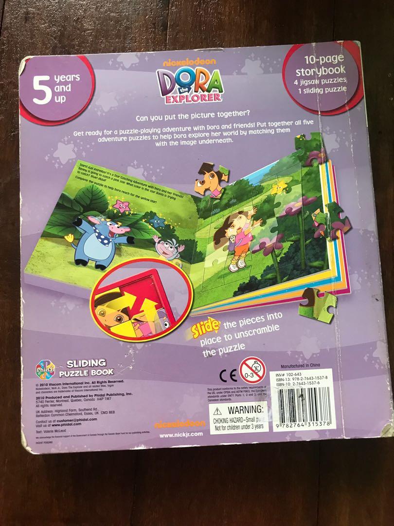 Dora sliding puzzle board books bundle, Hobbies & Toys, Books ...