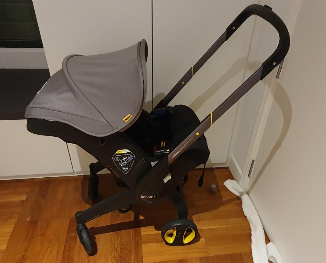 Doona + stroller / car seat with newborn inserts, Babies & Kids, Going ...